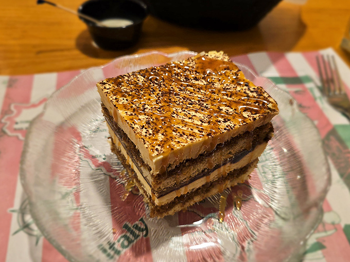 Layer upon heavenly layer of coffee-soaked perfection. The kind of dessert that makes you close your eyes and momentarily forget your own name.