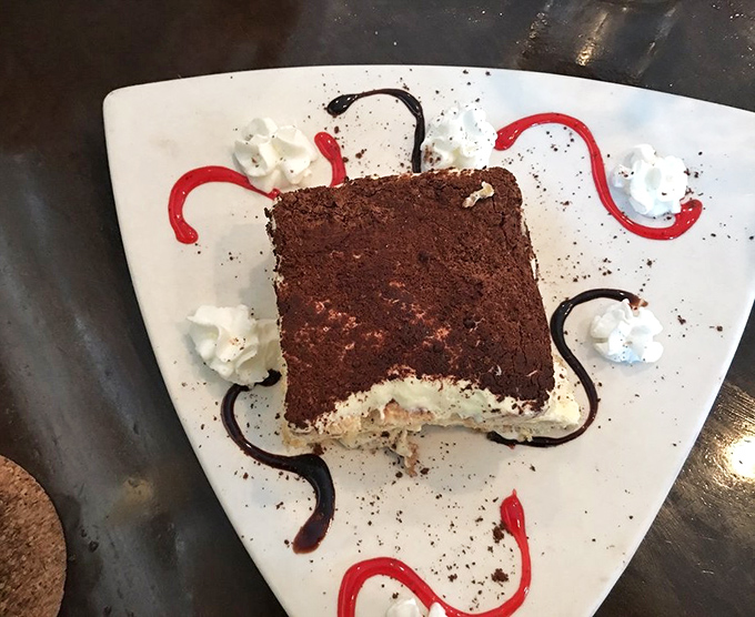 Tiramisu that strikes the perfect balance between coffee, chocolate, and mascarpone. It's the dessert equivalent of finding the perfect parking spot downtown.