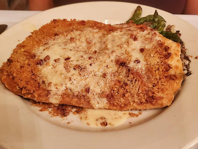 Golden-crusted trout that practically begs to be photographed before it's devoured. Food this pretty should come with its own Instagram account.
