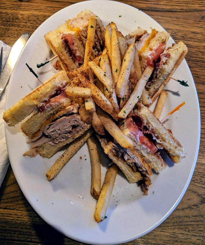 The club sandwich&mdash;architecture you can eat. Stacked higher than your weekend to-do list but infinitely more satisfying to tackle.