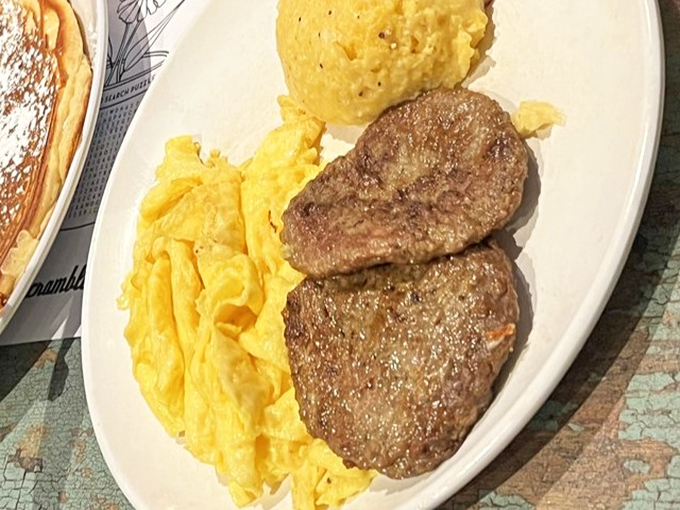 Sausage patties and scrambled eggs&mdash;a breakfast classic that proves sometimes the simplest combinations deliver the most profound satisfaction.