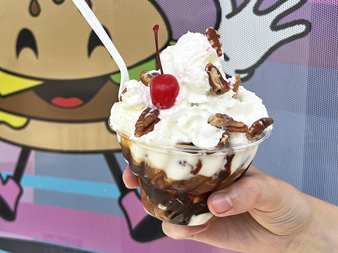 The Turtle Sundae arrives like a sweet geological formation – layers of vanilla, caramel, and chocolate topped with a pecan archipelago.