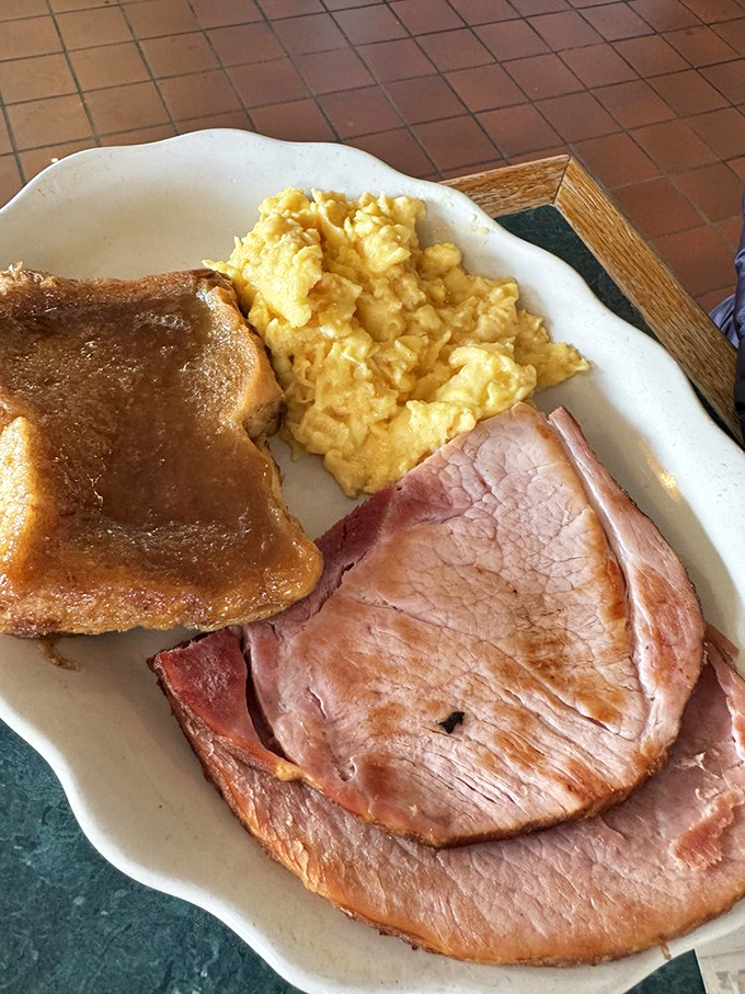 Breakfast perfection doesn't need fancy plating&mdash;just perfectly cooked eggs, thick-cut ham, and homemade toast that makes store-bought bread seem like a sad compromise.