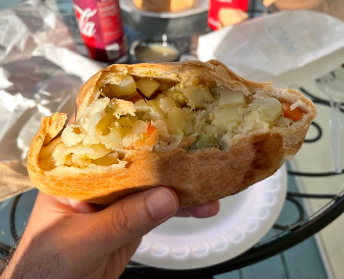 The veggie pasty reveals its colorful interior &ndash; a mosaic of potatoes, carrots and other vegetables tucked inside that perfect pastry pocket. Even meat-lovers might be converted.