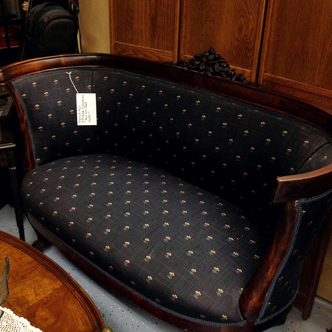 This Victorian settee has witnessed more drama than a soap opera and looks elegant enough for any modern parlor.
