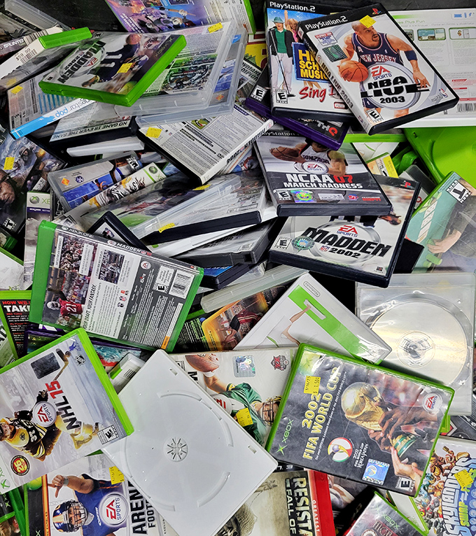 Video game time capsule! Every disc a portal to when NBA Jam was life and Madden didn't require a computer science degree.