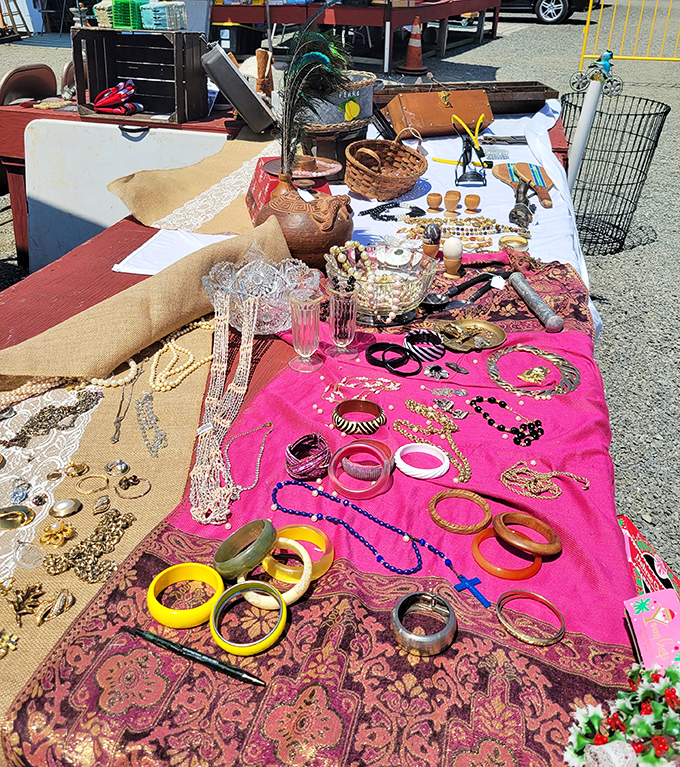 A kaleidoscope of vintage jewelry spreads across vibrant fabric. Grandma's costume pieces find new admirers in a different century.