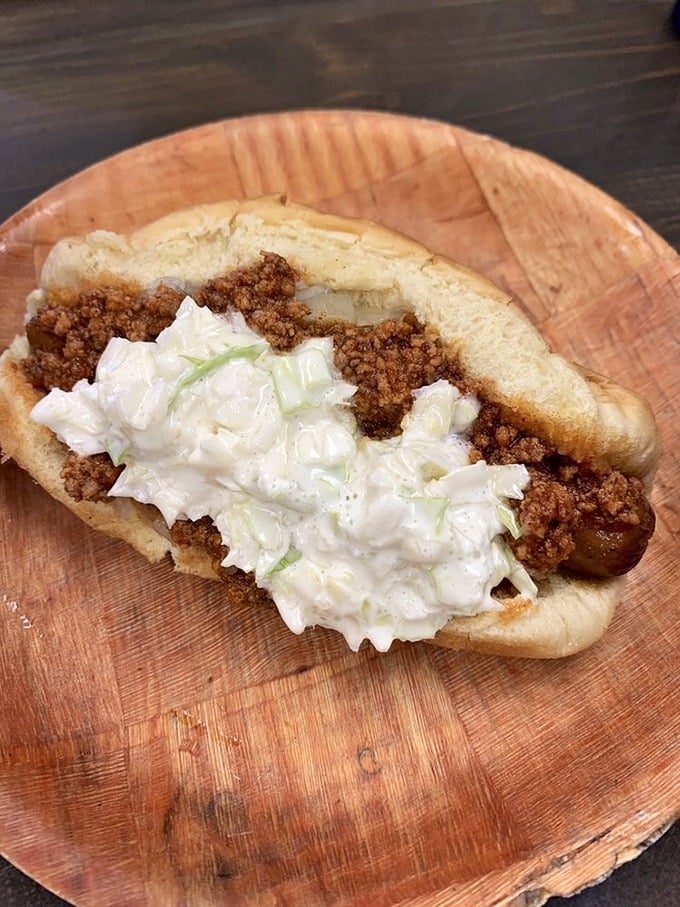 The West Virginia Dog comes dressed for success with chili and coleslaw. It's like a regional handshake in hot dog form.