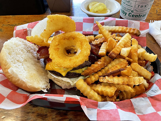 This isn't just a burger&mdash;it's a towering achievement of American engineering with onion rings playing the role of delicious structural support.