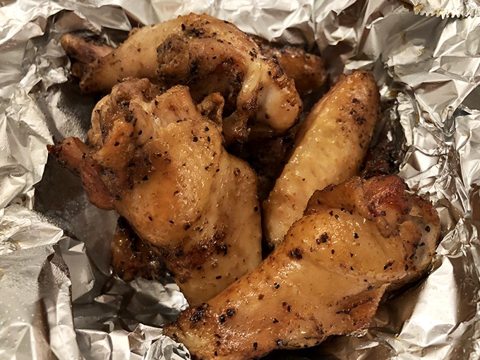 Wings that have clearly graduated from the smoke master's academy with honors. These aren't your average sports bar afterthoughts.