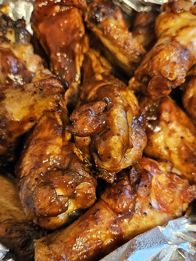 Wings so glossy they could be in a magazine photoshoot, except they're destined for a much better fate—your eager taste buds.