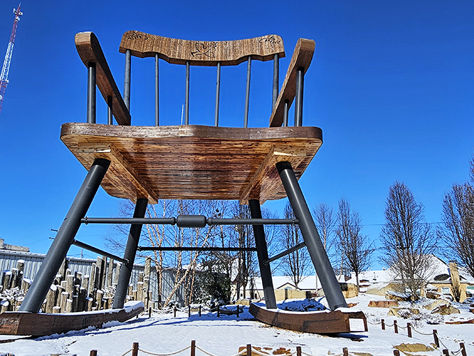 Winter transforms the World's Largest Rocking Chair into what looks like a prop from "Frozen: Giant's Edition."