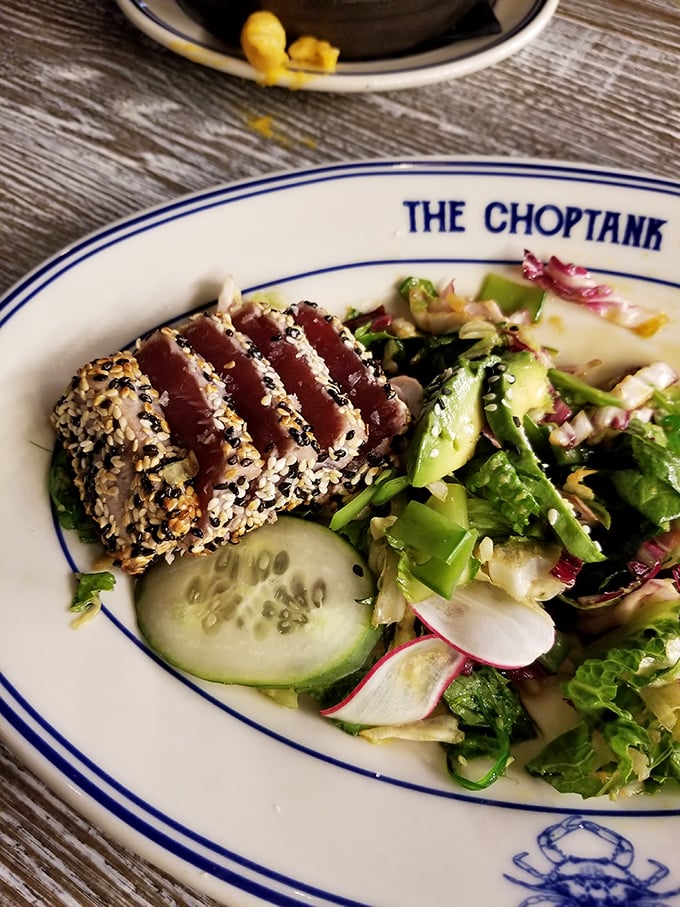 Sesame-crusted ahi tuna that's dressed better than most people at the Oscars, perched atop a garden of fresh greens and crisp vegetables.