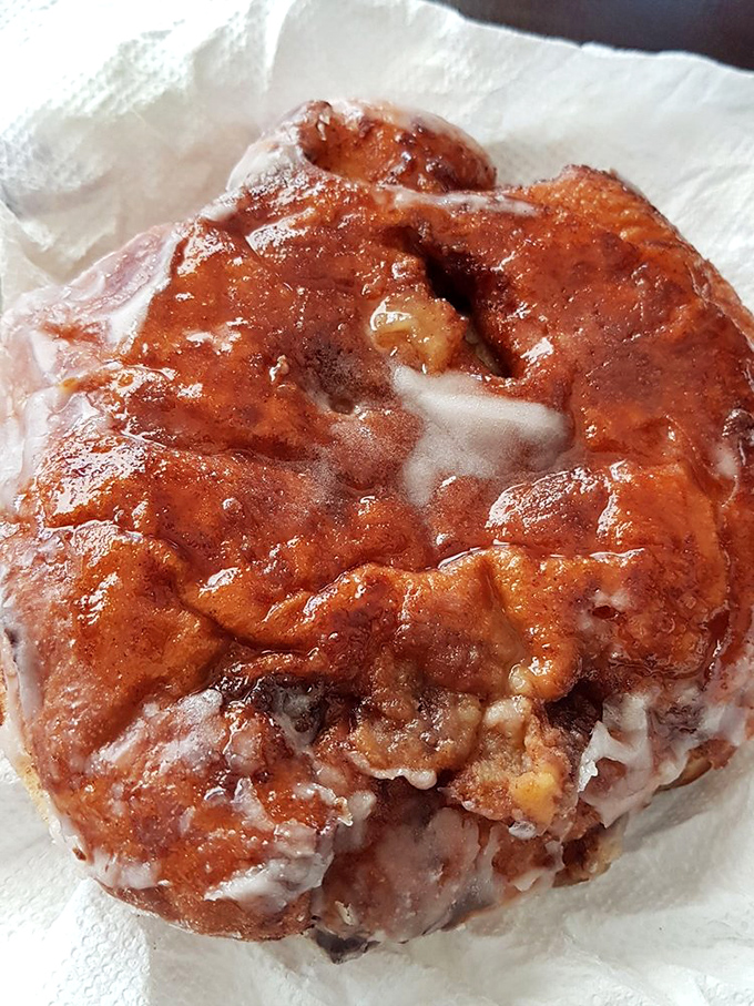 Not all heroes wear capes – some, like this apple fritter, wear a glaze so divine it should require its own religion.