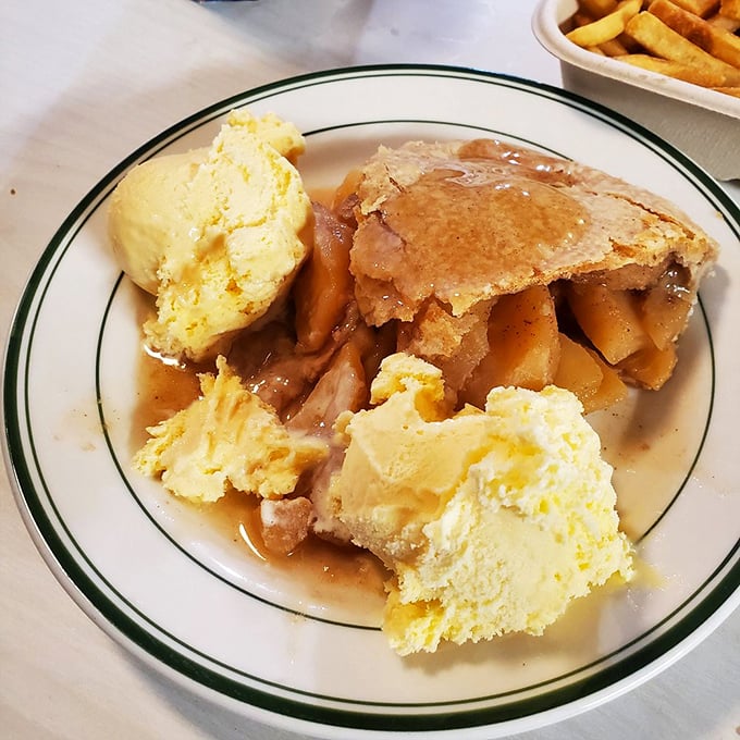 
Apple pie &agrave; la mode that would make your grandmother both jealous and proud. The vanilla ice cream melting into warm pie is nature's perfect symbiotic relationship.