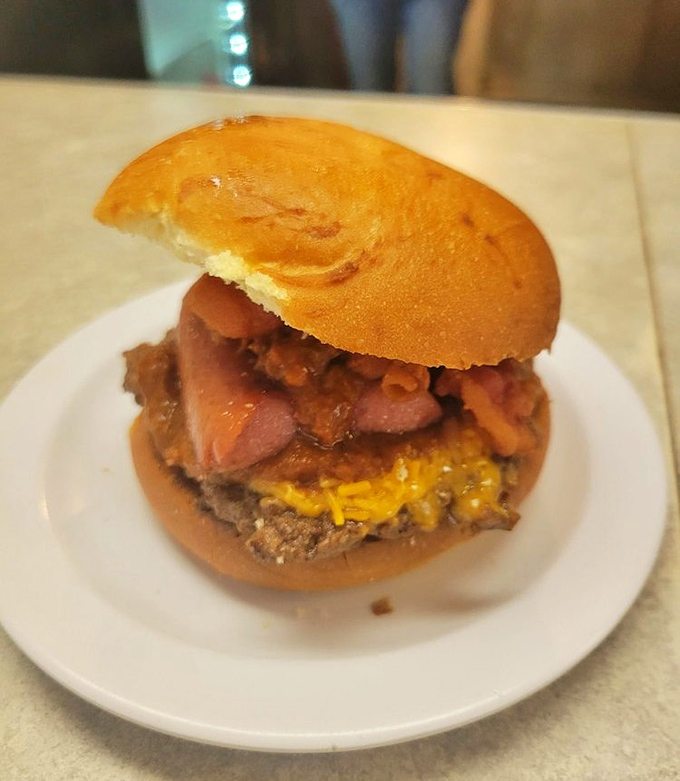 When bacon meets burger meets hot dog, beautiful things happen - this creation proves culinary rules are meant to bend.