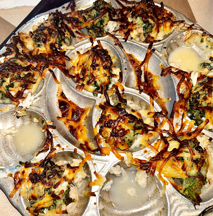 These baked oysters wear their toppings like crown jewels—cheese, herbs, and magic melted into little oceanic miracles.