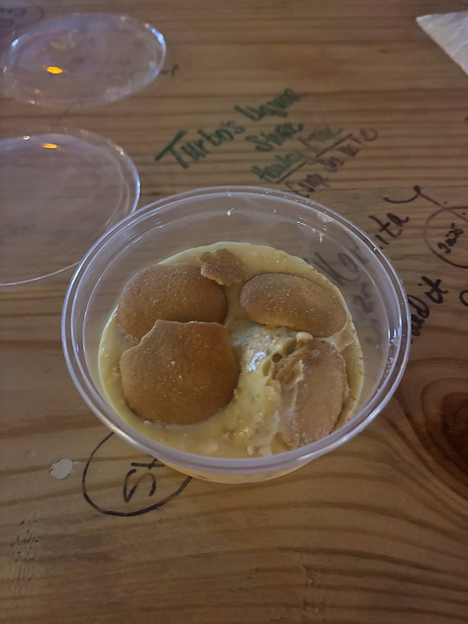 Banana pudding that whispers sweet Southern secrets, layered like edible architecture in pristine white containers.