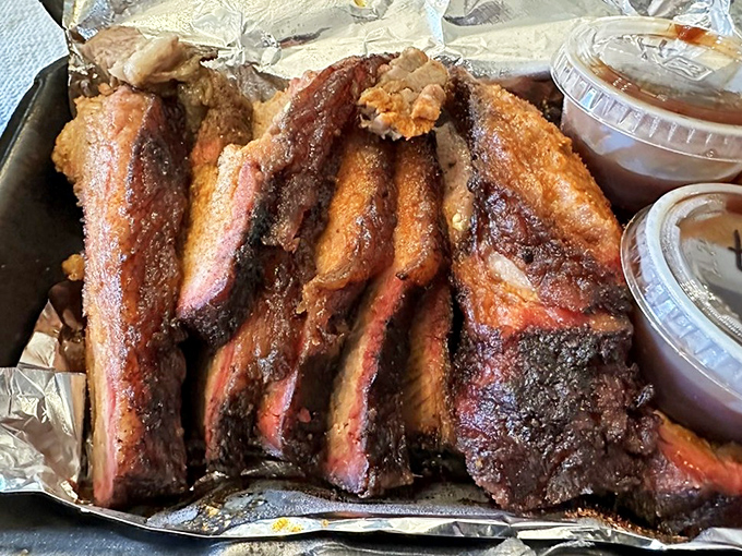 Brisket that's had a longer smoke than a 1970s rock band. The bark on this beauty is the BBQ equivalent of winning the lottery.