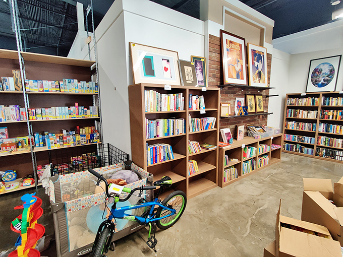 The book section: where bibliophiles can stock their shelves without emptying their wallets, and that blue bike is someone's nostalgic dream.