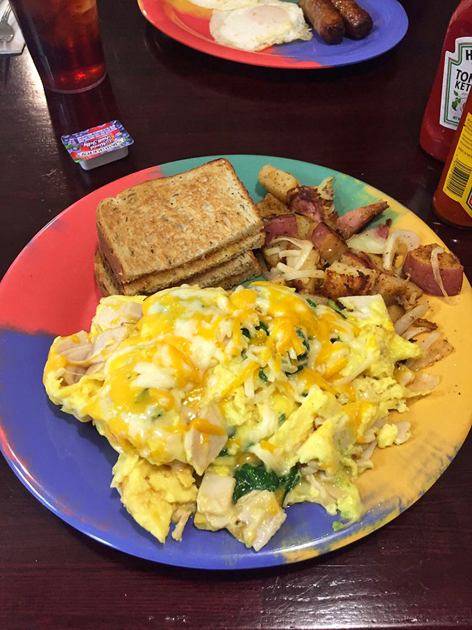 An omelette that's actually fluffy, potatoes with purpose, and toast that didn't forget its job is to soak up egg yolk.