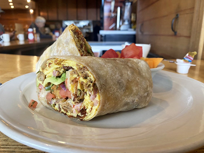 The legendary breakfast burrito in its natural habitat. A tortilla-wrapped miracle stuffed with eggs, meat, and vegetables that could fuel you through an apocalypse.