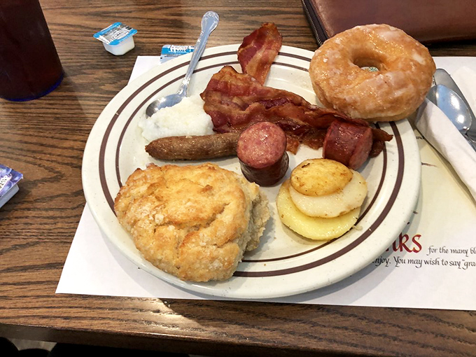 The breakfast platter that launched a thousand return trips&mdash;crispy bacon, perfect eggs, and a biscuit that deserves its own fan club.