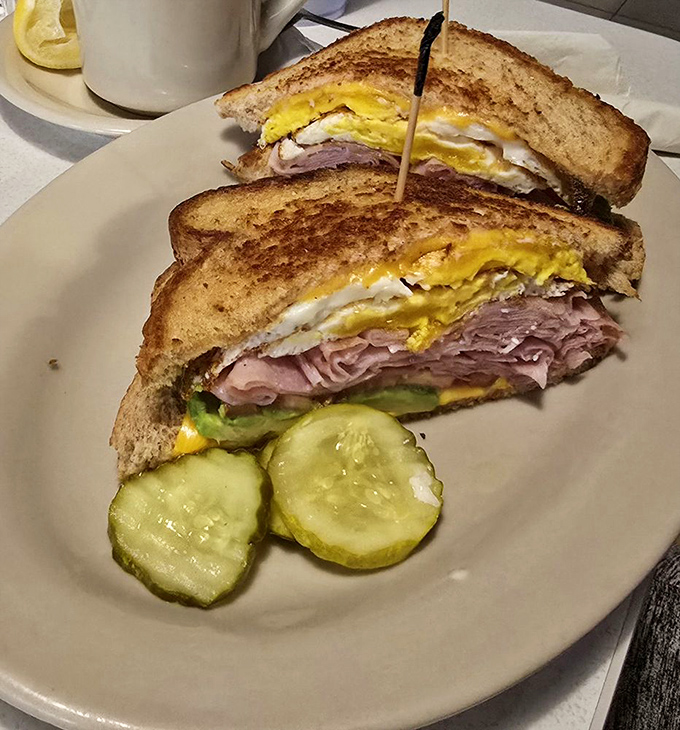 The breakfast sandwich that launched a thousand food comas&mdash;layers of ham, egg, and cheese creating the morning trilogy your taste buds deserve.