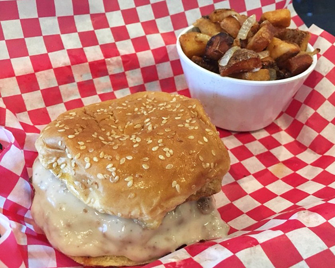 Not just a burger, but a masterpiece of melted cheese cascading over a hand-formed patty. Napkins required, regrets impossible.