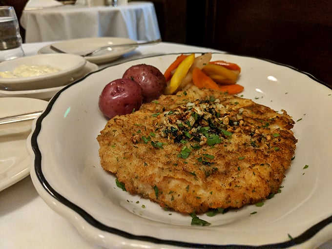 The legendary calamari steak&mdash;golden, crisp, tender within. This isn't bar food; it's the reason San Franciscans have kept this place in business.