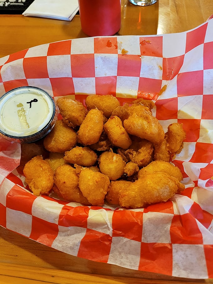 Cheese curds that squeak with freshness and deliver that perfect Wisconsin dairy farm authenticity experience.