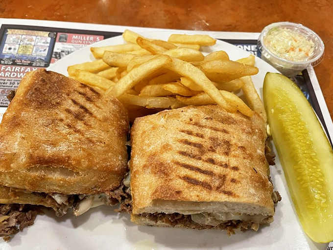 Not all heroes wear capes—some come on grilled bread with perfectly melted cheese. This sandwich demands to be eaten with both hands.