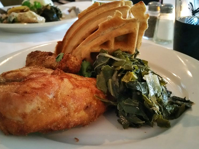 Chicken and waffles with collard greens &ndash; the ultimate Southern power couple, bringing together sweet, savory, and soul-satisfying on one magnificent plate.
