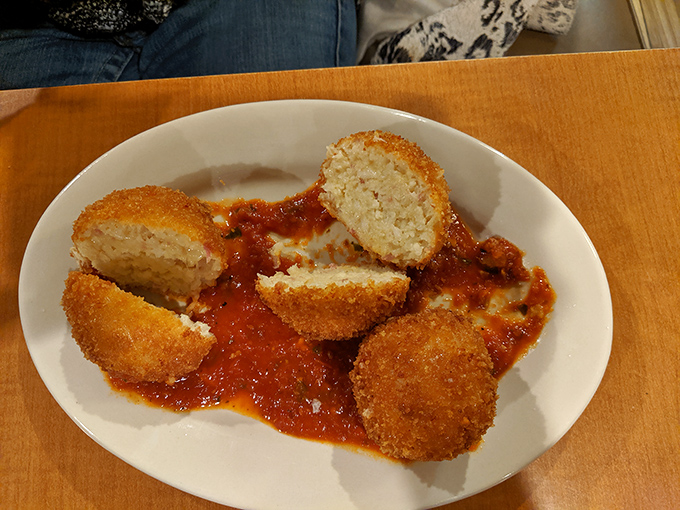 These golden-brown chicken croquettes lounging in marinara are what would happen if comfort food went to finishing school.