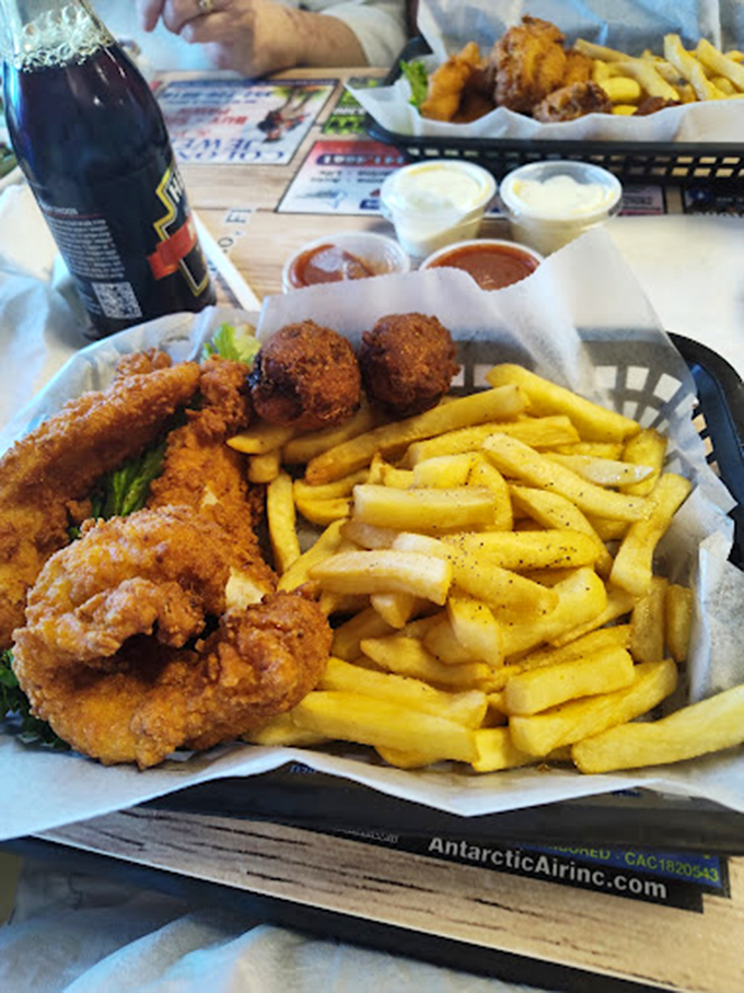 Golden chicken fingers that crunch like autumn leaves but taste infinitely better than any childhood memory.