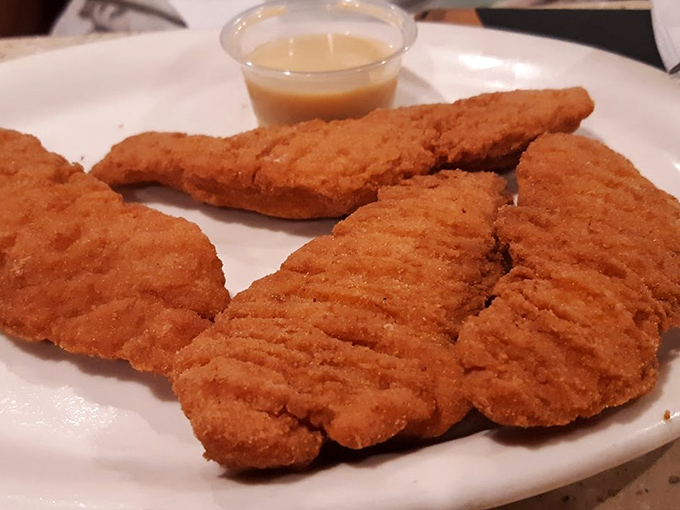 Chicken fingers that actually taste like chicken&mdash;a crispy, golden reminder that simple food done right is culinary poetry.