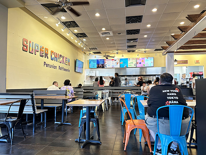 The bright, airy dining space at Super Chicken feels like the living room of that friend who always feeds you too well.