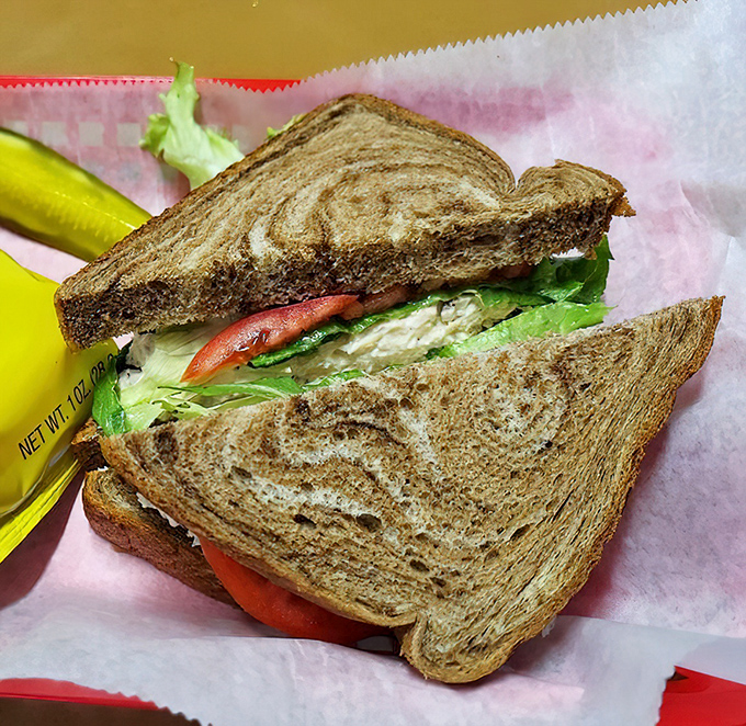 Marble rye embraces fresh veggies and what appears to be chicken salad&mdash;a sandwich that wouldn't be out of place in a New York deli.