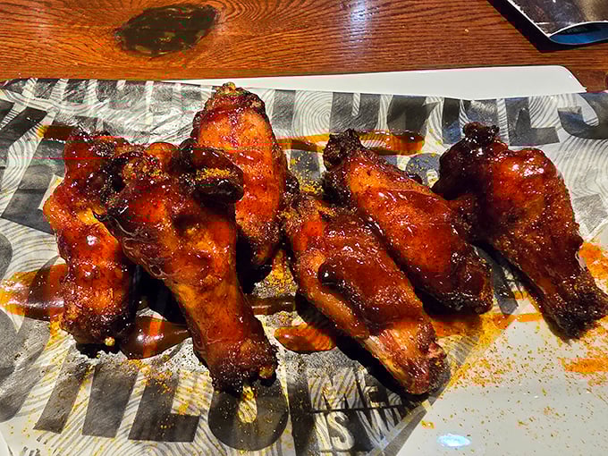 Wings that have clearly been introduced to heat and smoke properly, like distant relatives who immediately hit it off at a family reunion.