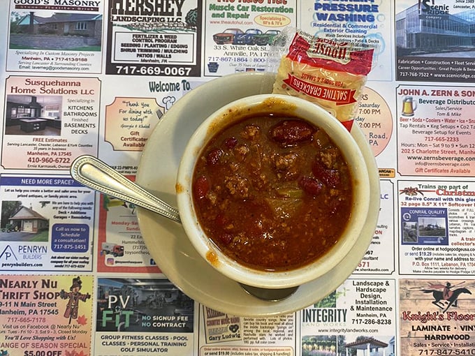 A bowl of chili sitting atop the local paper&mdash;getting the news while you eat the views of Lancaster County's finest.