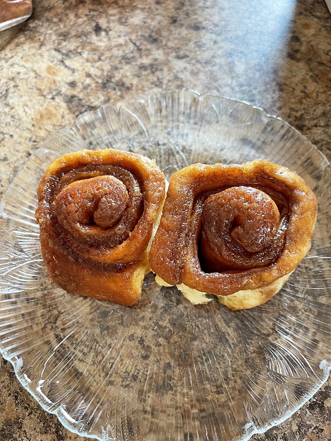 Cinnamon rolls with that perfect spiral &ndash; like edible hypnosis trying to convince you that calories don't count on vacation. Spoiler alert: they don't.