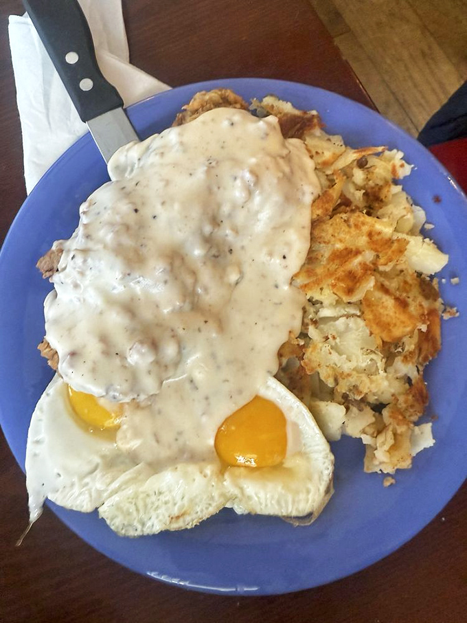 Country fried steak swimming in gravy with those perfectly crispy potatoes. Cardiologists hate this one simple trick for achieving breakfast bliss.