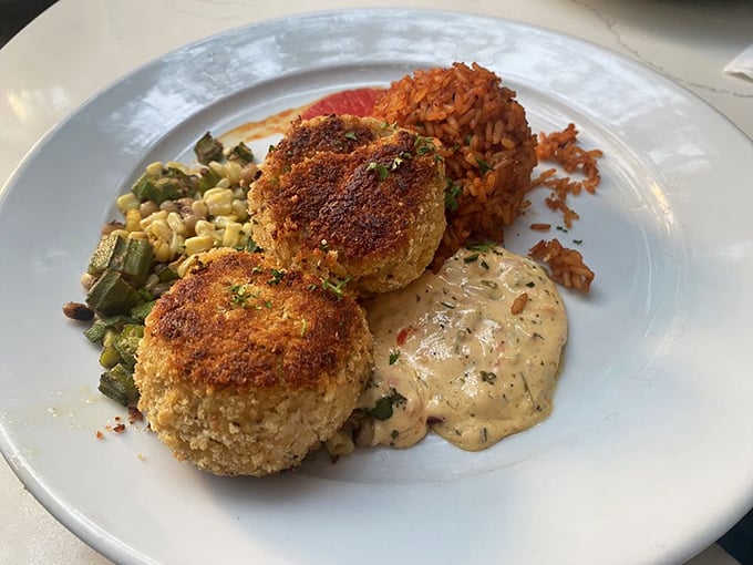 Carolina crab cakes that are mostly crab, barely bound, and perfectly bronzed&mdash;served with a sauce that deserves its own fan club.
