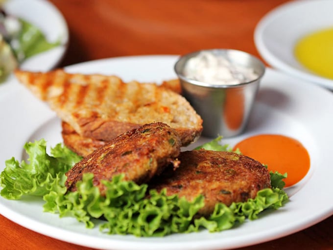 These crab cakes aren't just good, they're "text your foodie friends at inappropriate hours" good. The sauce is liquid gold.