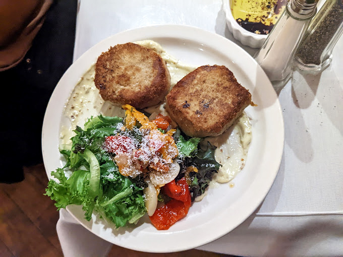 These aren't just crab cakes; they're little golden discs of oceanic joy that make you question why you ever order anything else.