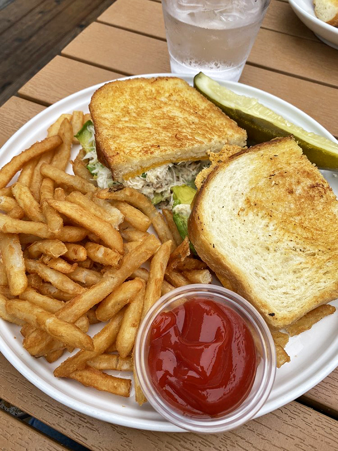 The humble crab sandwich gets a coastal California makeover. Crispy bread, generous filling, and those fries&mdash;carb paradise found!