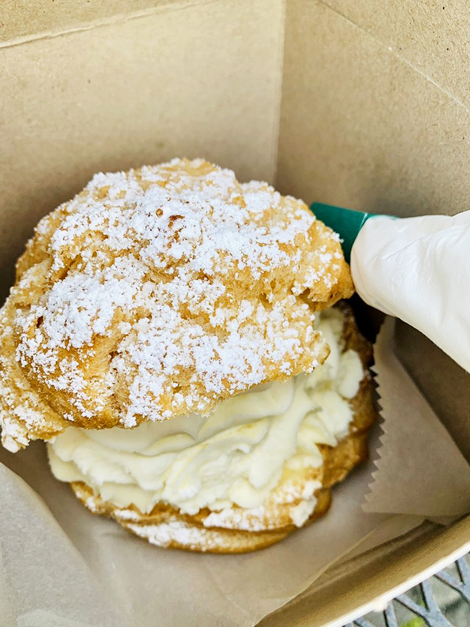 This cream puff isn't just dessert, it's architecture &ndash; a delicate structure housing a cloud of cream that demands to be photographed before devoured.