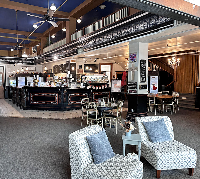 The lounge area invites you to sink in and contemplate the deeper meanings of dessert while the elegant counter stands ready for service.