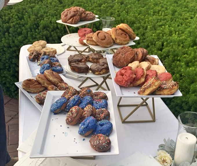 Donut heaven exists, and it looks suspiciously like this spread. The kind of display that makes dietitians cover their eyes in horror.