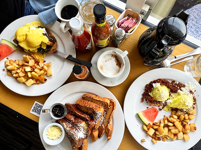 The breakfast spread that launched a thousand Instagram posts. French toast, Eggs Benedict, and those potatoes—a holy trinity of morning delights.